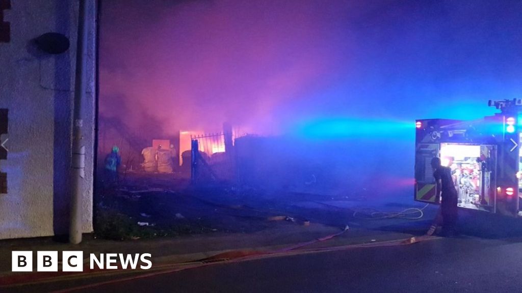 Crews tackle blaze at disused building in Wigston - BBC News