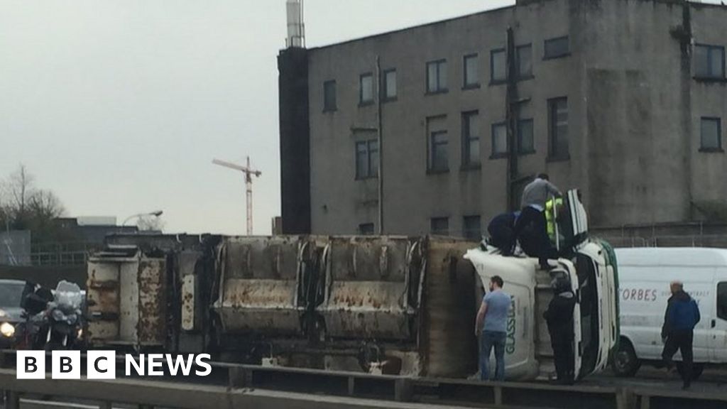 Long delays as lorry overturns on M2 leaving Belfast - BBC News