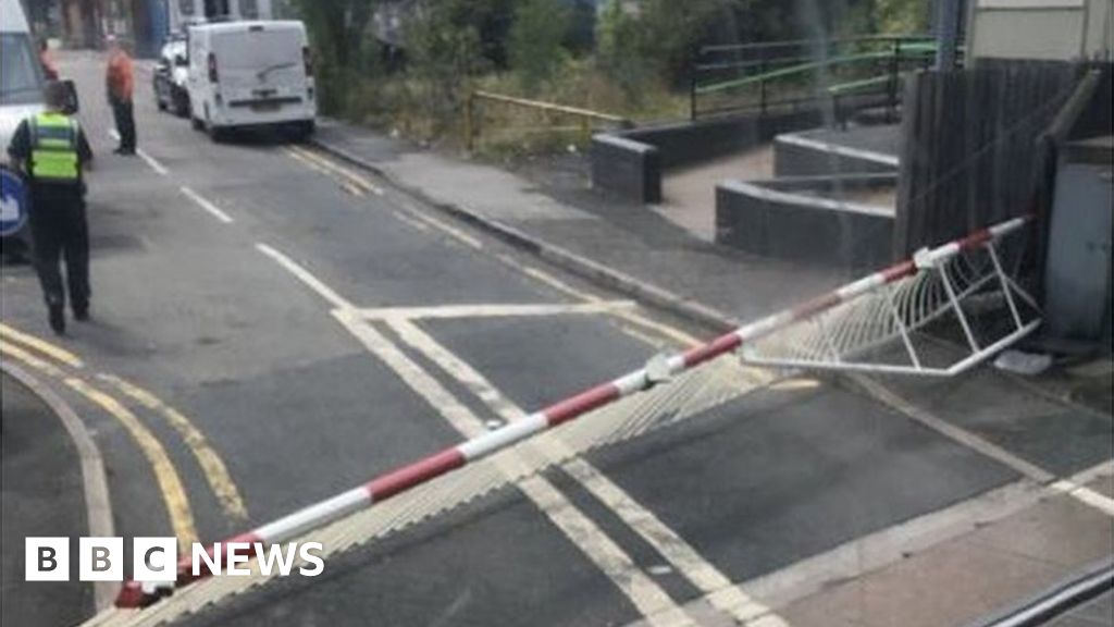 Level crossing crash disrupts train services - BBC News