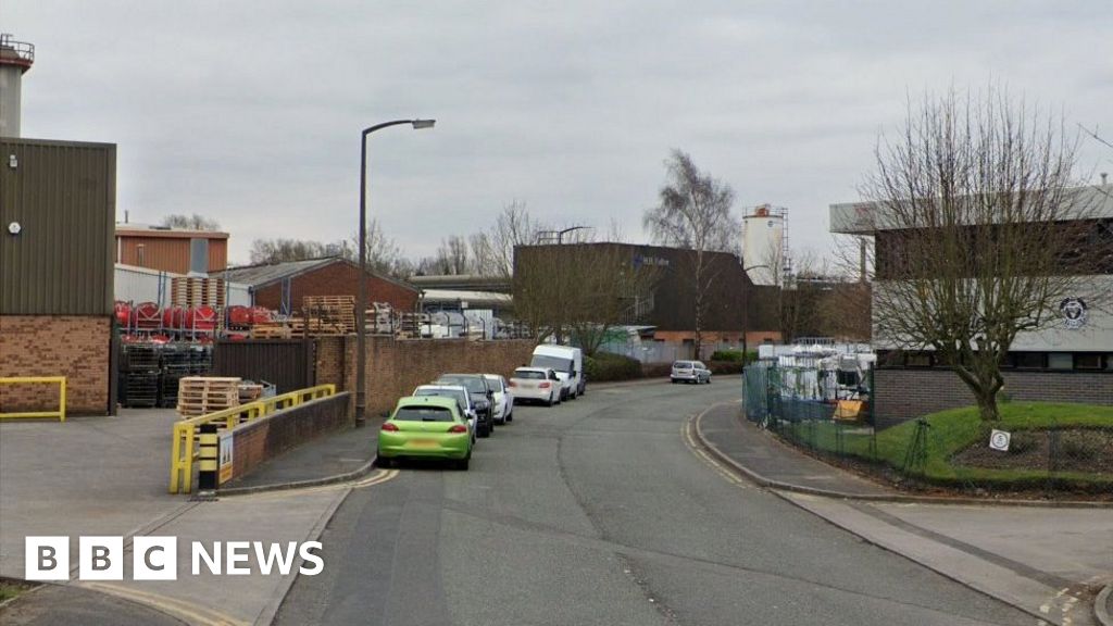 Dukinfield: Worker hit by digger on industrial estate dies
