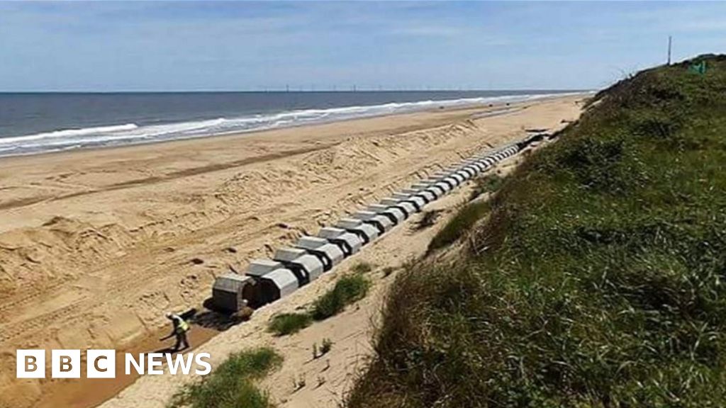 Hemsby tidal surge community get new sea defences - BBC News
