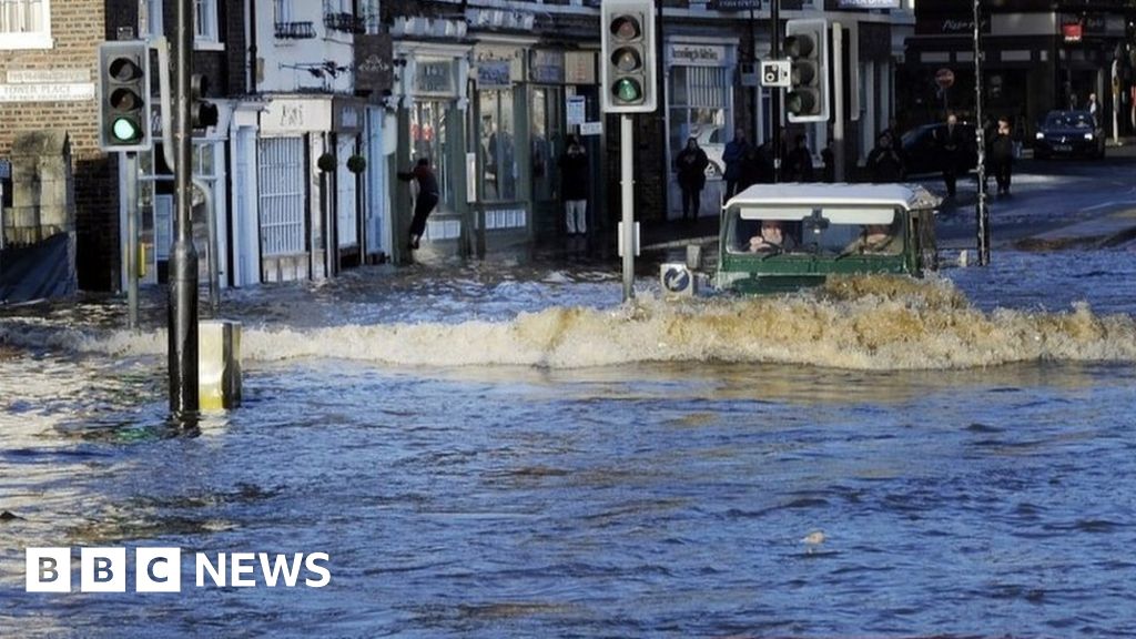 Newspaper headlines: Flooding devastation dominates front pages - BBC News
