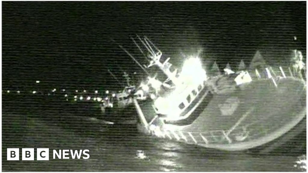 Fishermen rescued from sinking trawlers at Dartmouth - BBC News