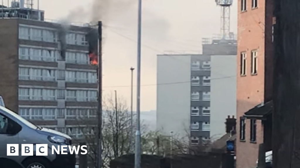 Hanley tower block fire: Man arrested on suspicion of arson - BBC News
