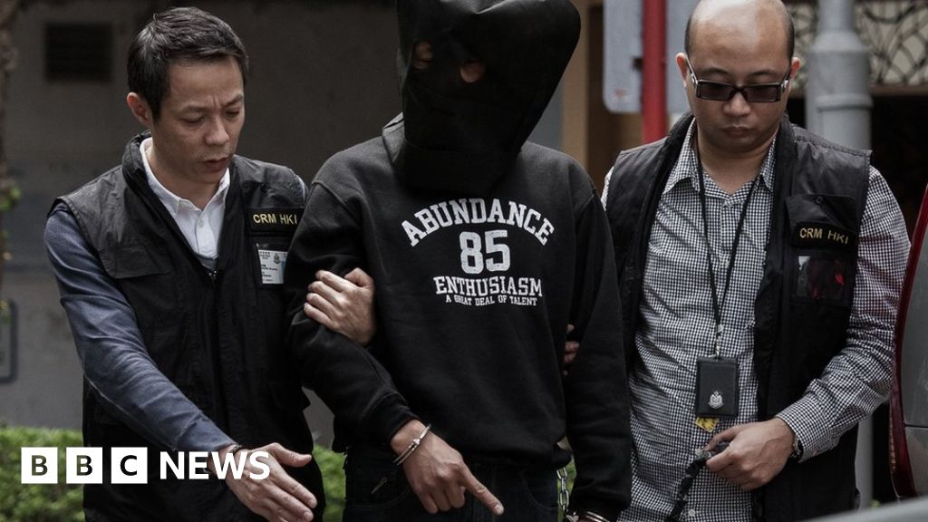 Two men guilty of attacking HK editor get 19 years in jail - BBC News