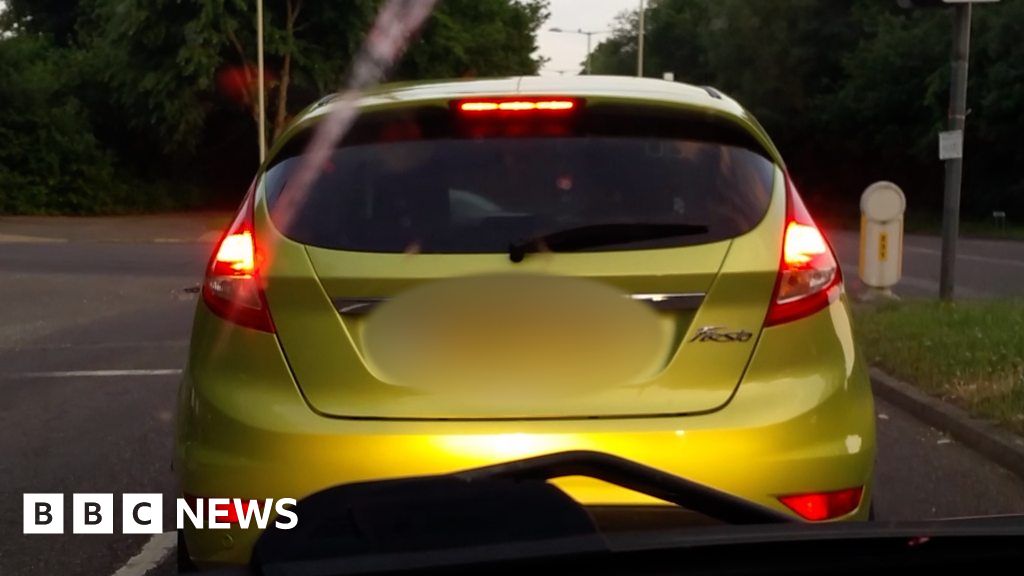 Dashcam footage captures 'distracted' driver - BBC News