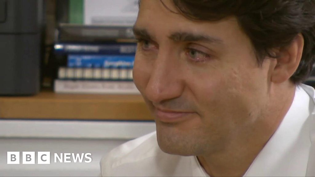 Canada's Justin Trudeau has tearful reunion with Syrian refugee - BBC News