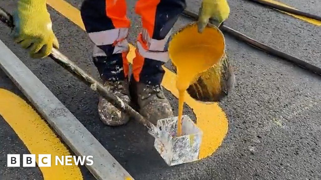 Watch: How yellow letters are drawn on roads - BBC News