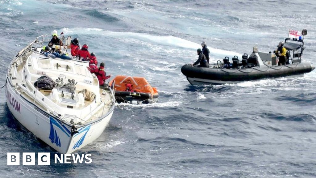 Royal Navy warship rescues stranded yacht crew in Atlantic - BBC News
