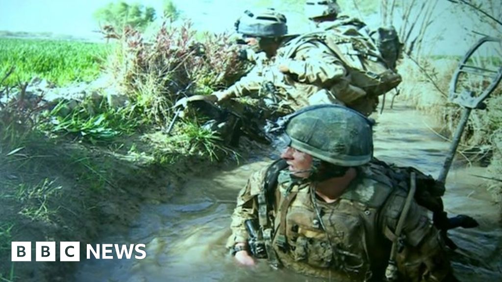 RAF Cosford defence photography school marks centenary - BBC News