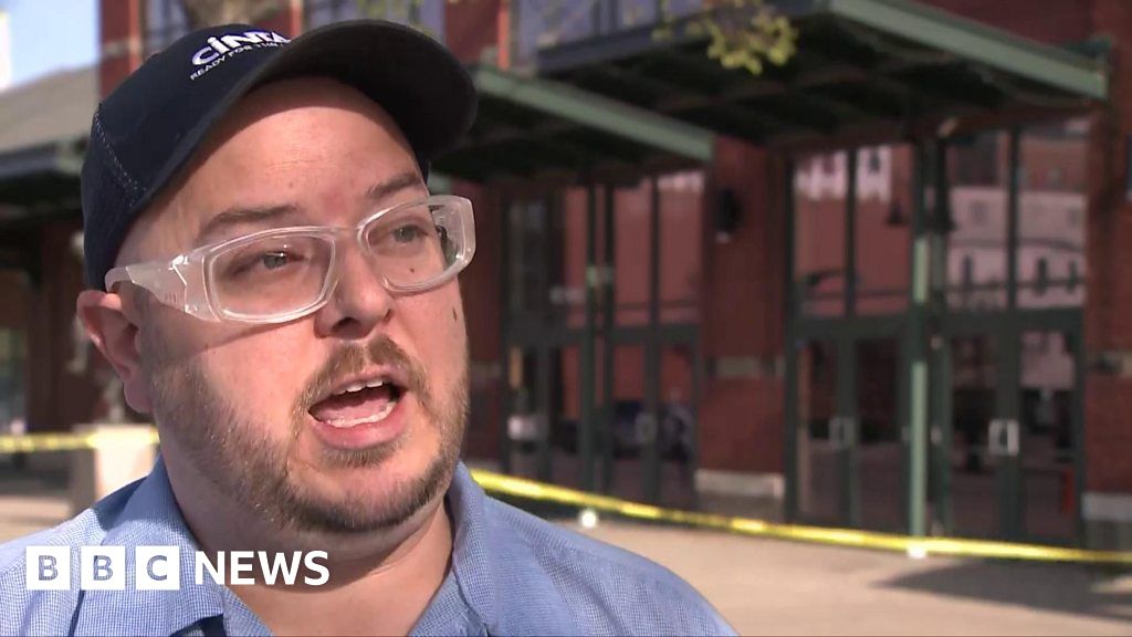 Kentucky man's wife hid in bank vault during shooting