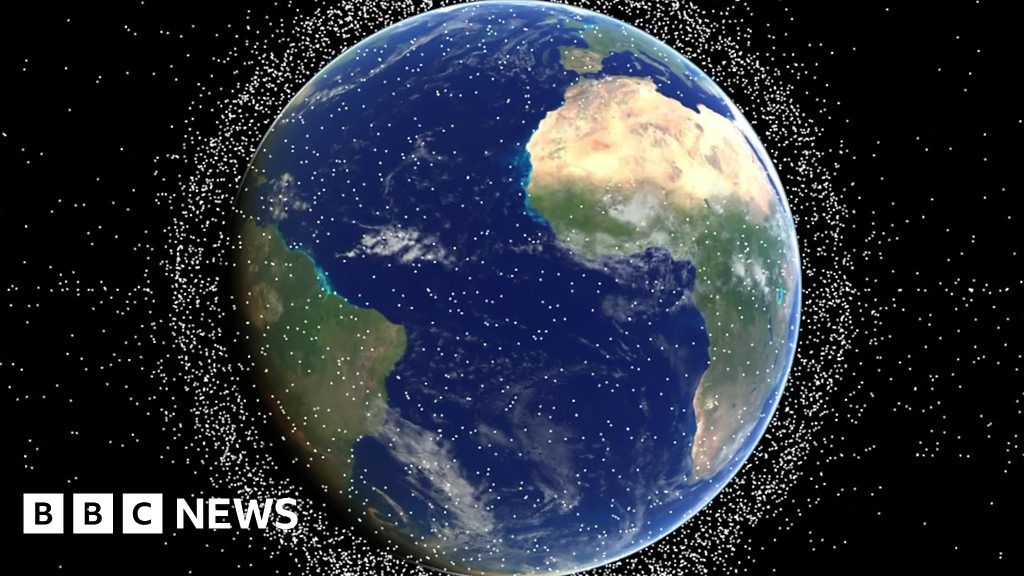 Space junk: Harpoon tested to clean up space - BBC News