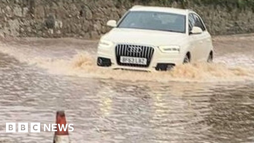 Anglesey: Villagers' worry at being cut off by flooded road - BBC News