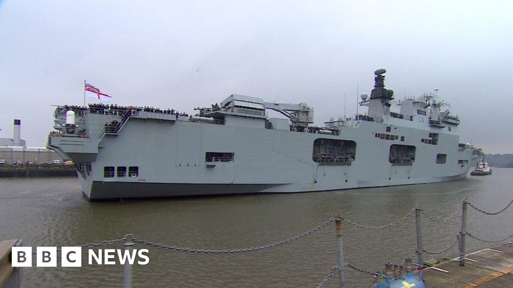 HMS Ocean sails into Devonport base for the final time - BBC News
