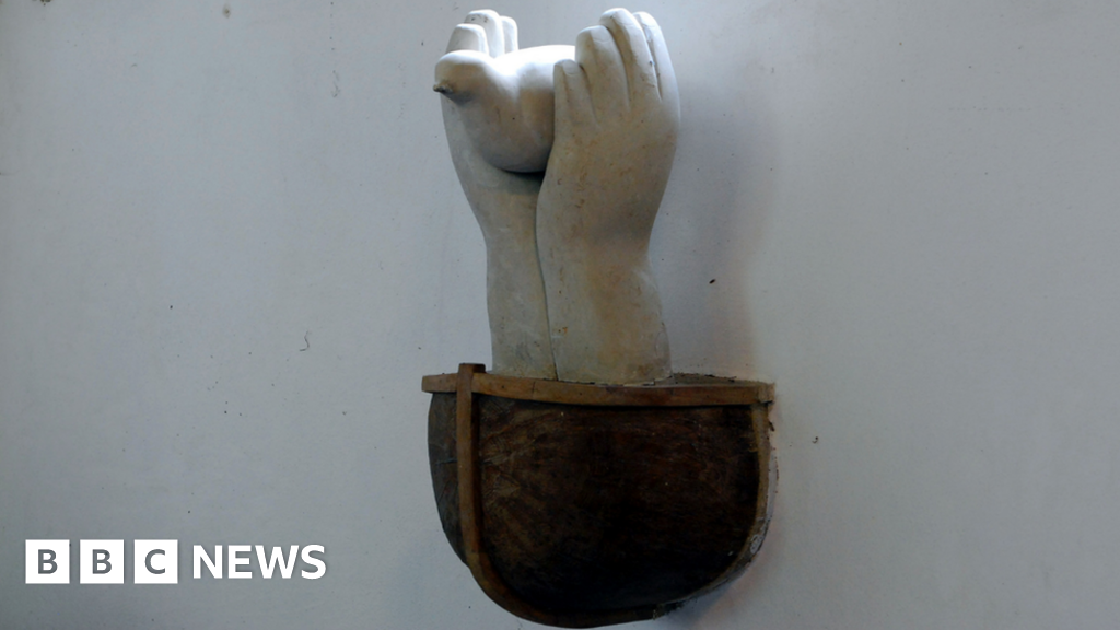 Assington church calls for missing stone dove to be returned - BBC News