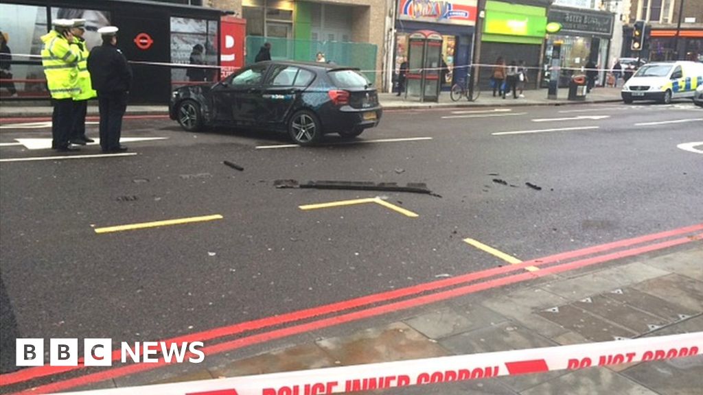 Two men badly injured in Dalston 'racing' car crash - BBC News