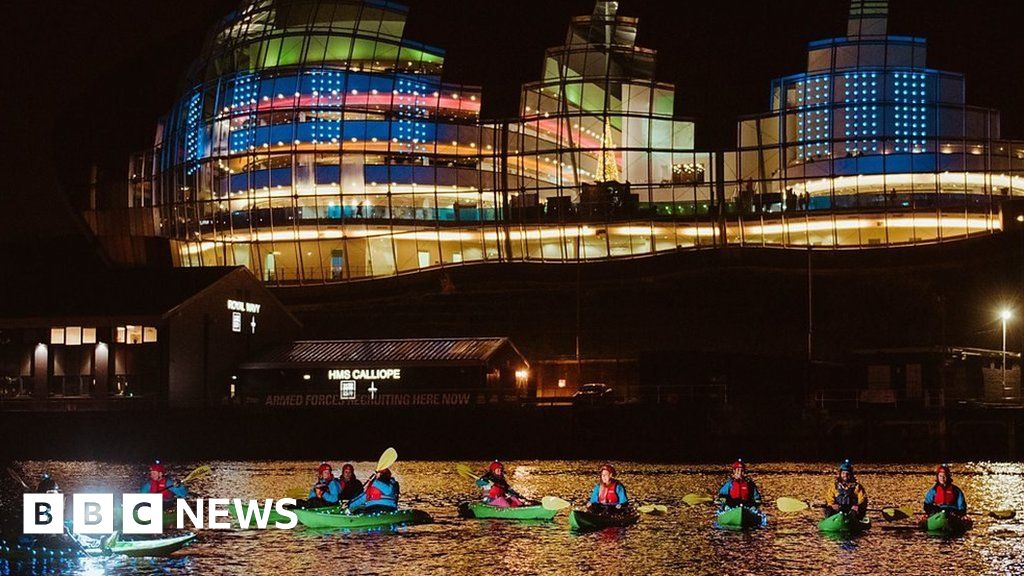 River Tyne neon kayaking offers views of Newcastle by night - BBC News