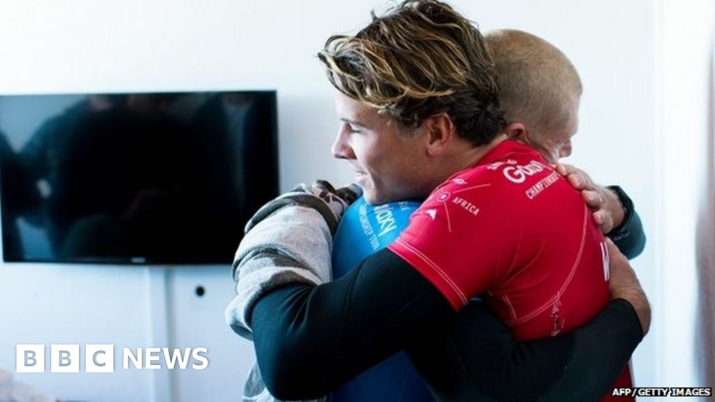 Mick Fanning tribute to fellow surfer after shark attack - BBC News