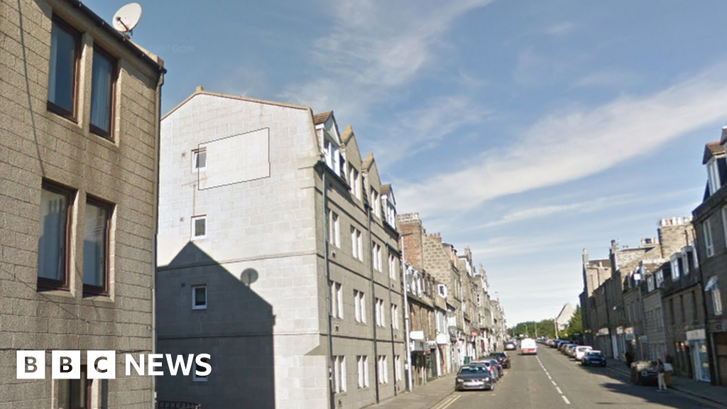 Man charged after serious assault in Aberdeen block of flats - BBC News