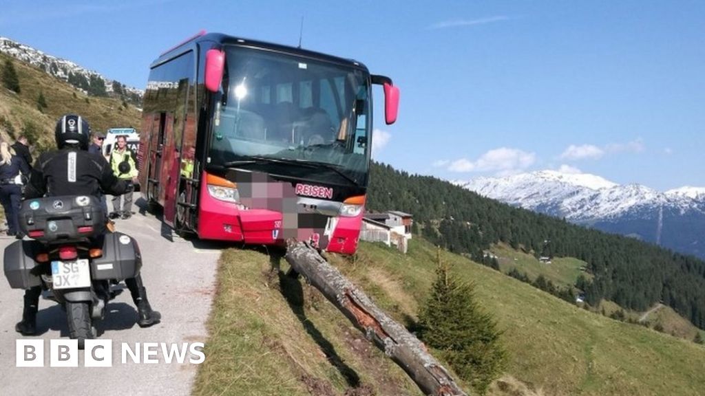 Bus crash in Austrian Alps averted after tourist applies brake - BBC News