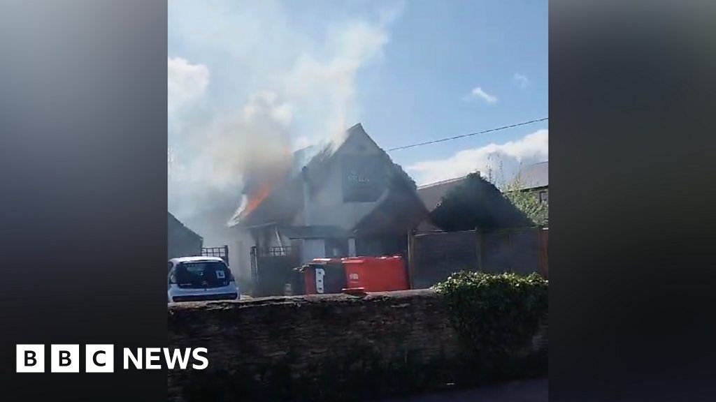 Flames engulf roof of Indian restaurant in Sherston - BBC News