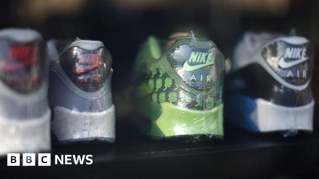 Nike shares lead Dow Jones higher - BBC News