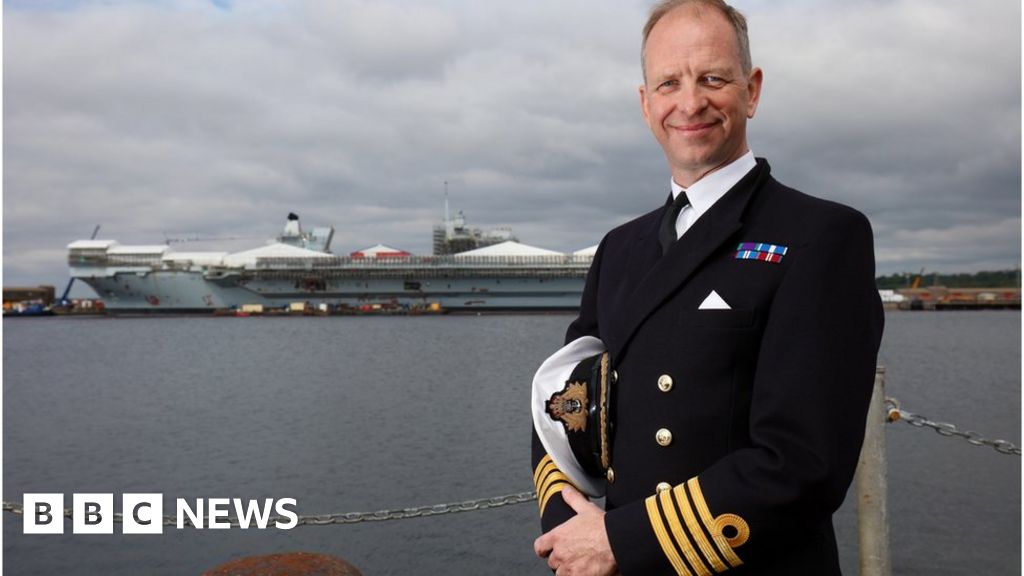 Captain takes control of Navy's latest aircraft carrier - BBC News