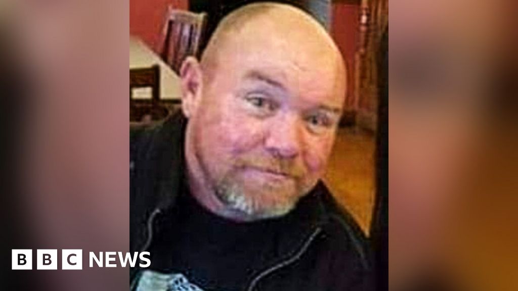 Padiham death: Murder charge over man's body found at house - BBC News