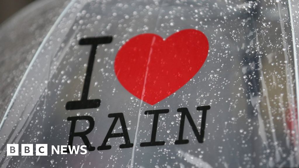 Yellow flood warning as torrential downpours hit Wales - BBC News