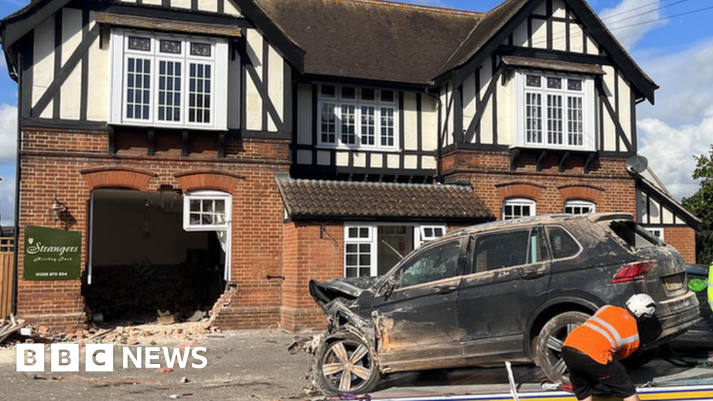 Two taken to hospital after car crashes into Bradfield pub - BBC News