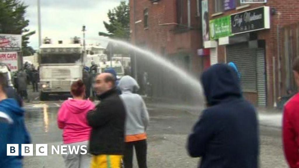Nine officers injured after Belfast anti-internment parade violence ...