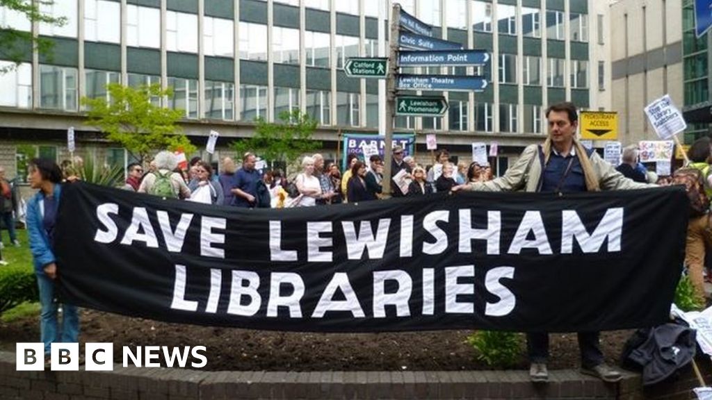 Hundreds protest against Lewisham library cuts - BBC News