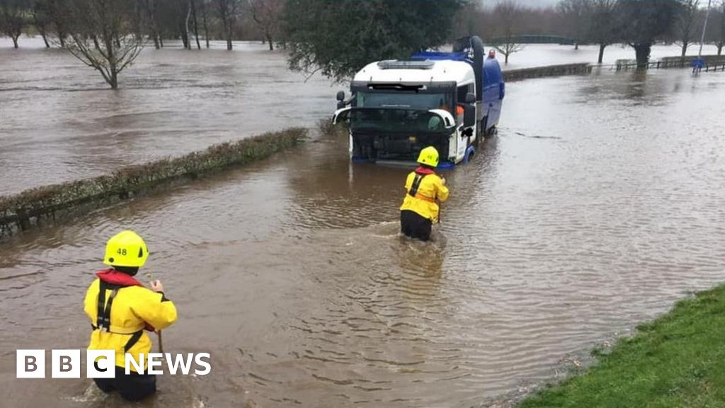 Flood warnings remain across UK following downpours - BBC News