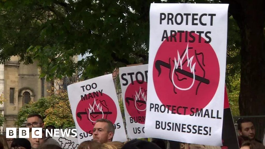 Belfast artists protest for more affordable workspaces - BBC News