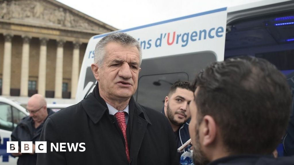 French MP left red-faced after parked car blocks train - BBC News
