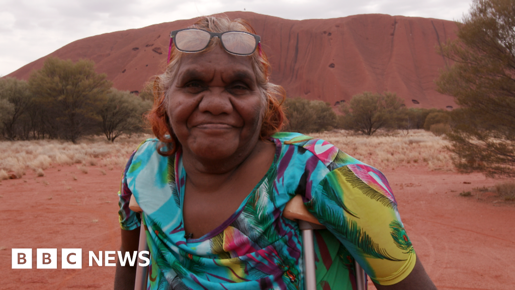 Banning the Uluru climb: 'This rock means everything to us' - BBC News