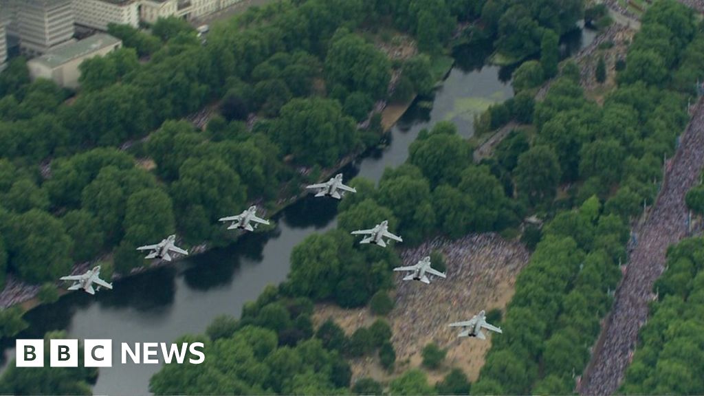 RAF centenary: Thousands gather for flypast - BBC News