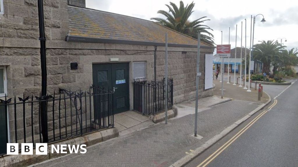 Man arrested over suspected Penzance railway station arson - BBC News
