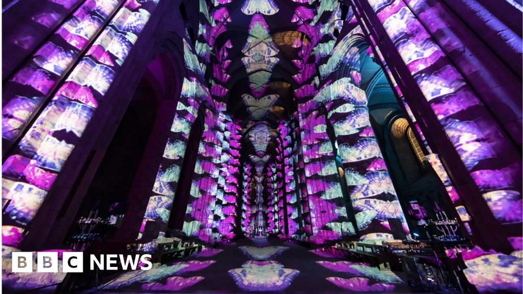 Durham Cathedral interior illuminated in stunning colours - BBC News