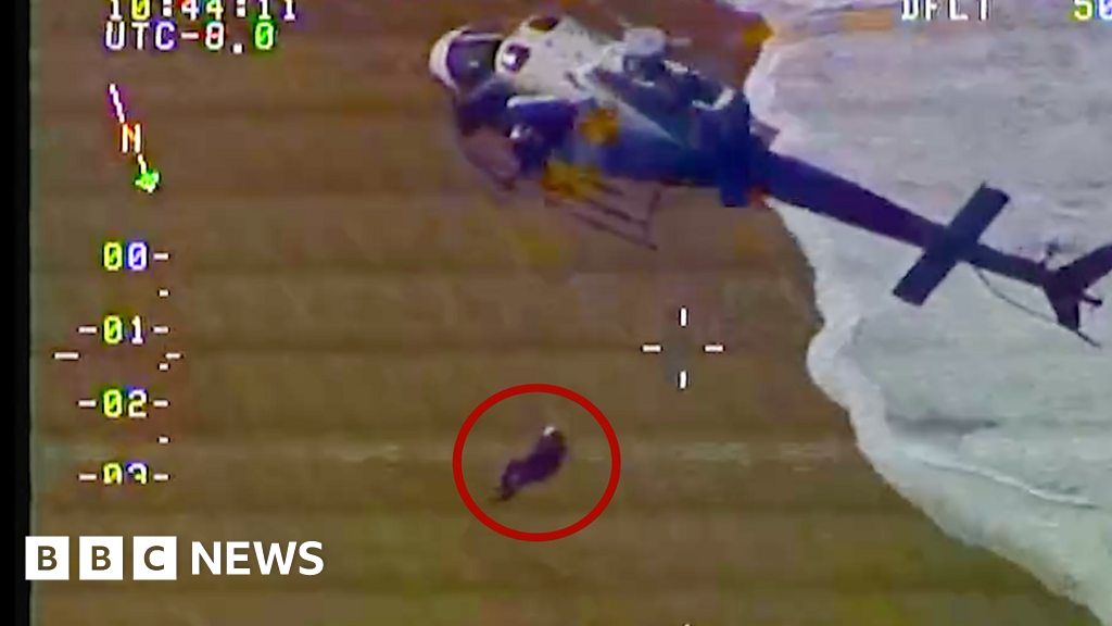 Man airlifted after two days stuck on seaside cliff - BBC News