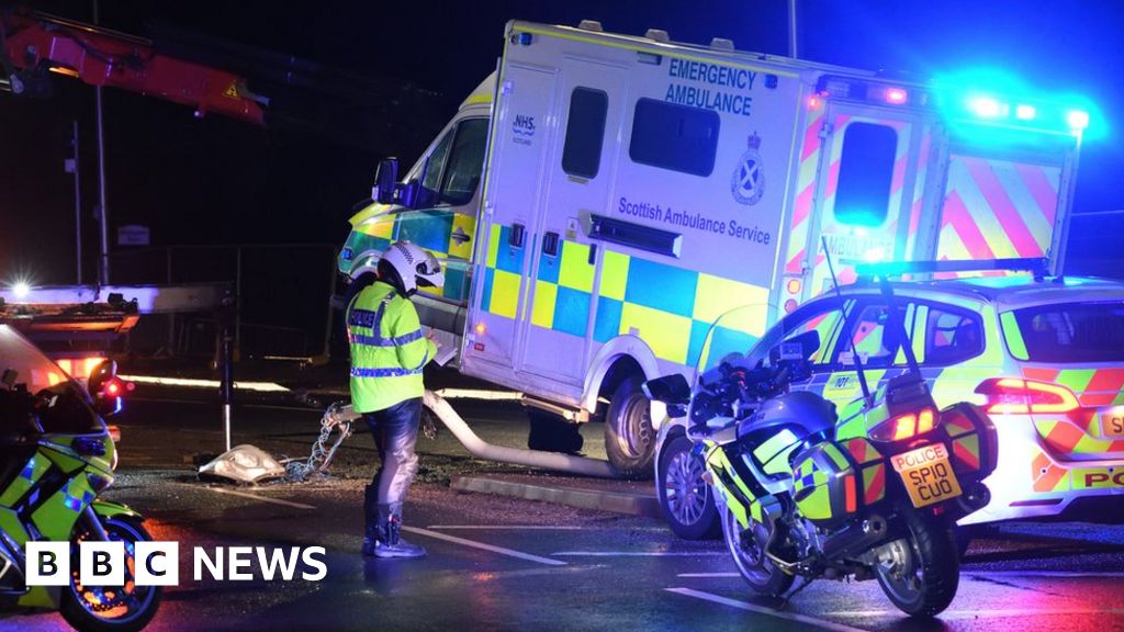 Ambulance crashes en route to collect patient