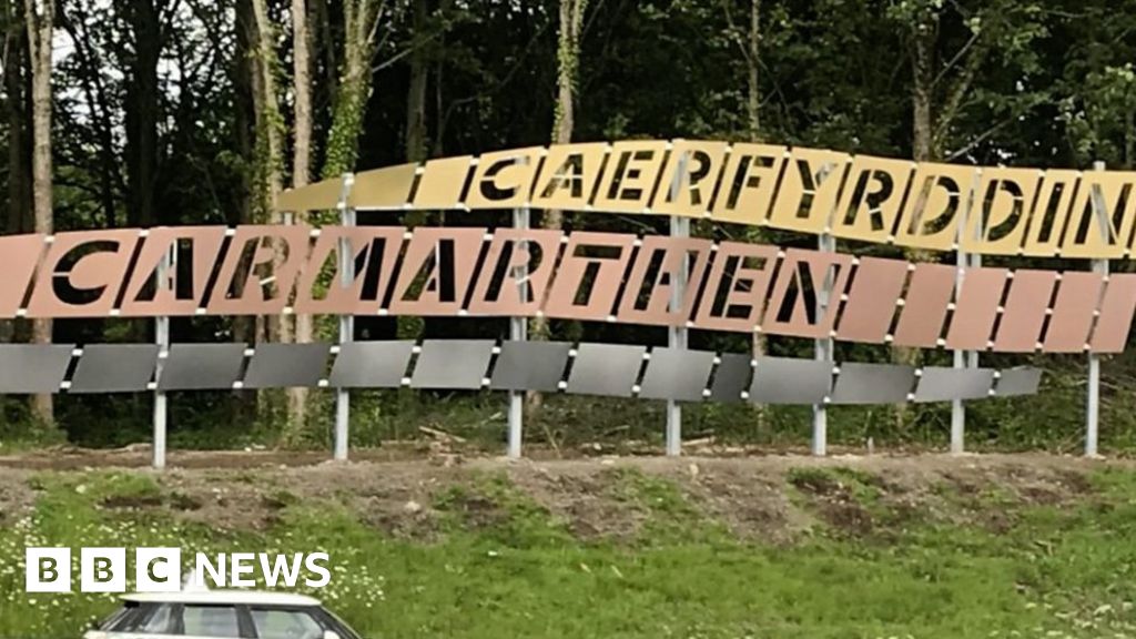 Carmarthen sign the latest controversial roadside display - BBC News