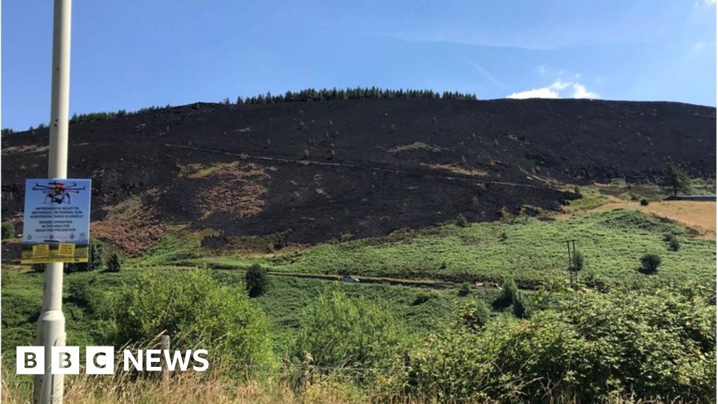 Maerdy mountain wildfire was 'started deliberately' - BBC News