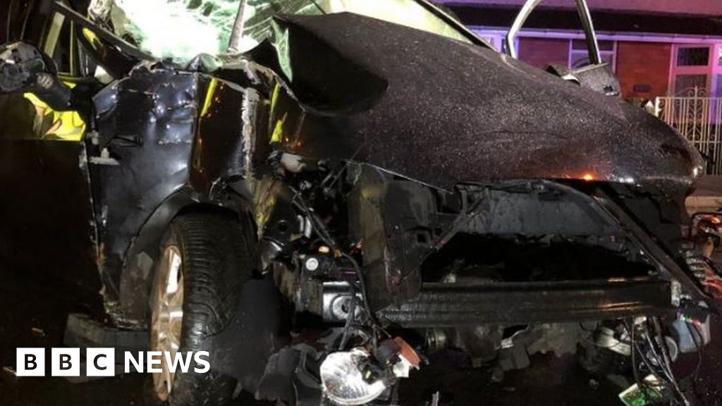 Woman cut from car after serious crash in Tipton - BBC News