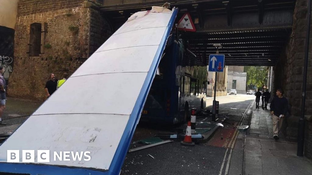 Bus hits bridge in Bristol city centre crash - BBC News