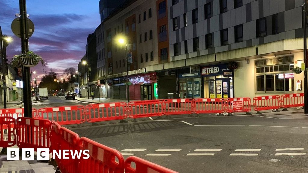 Debris cleared after roof blown off in Slough - BBC News