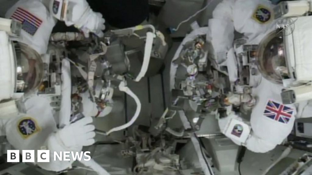 Tim Peake 'suits up' ahead of his historic spacewalk - BBC News