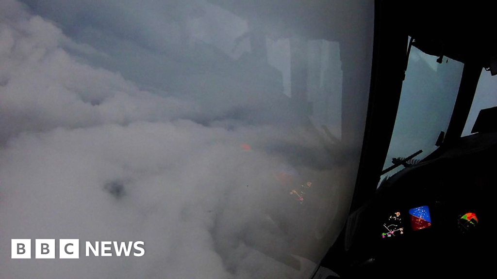 Hurricane Irma: View from plane flying inside storm - BBC News