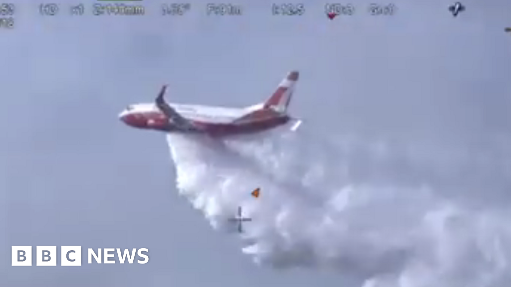 Modified Boeing 737 used to fight wildfire for first time - BBC News