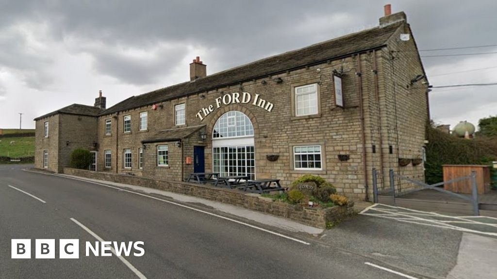 Teenager fights for life after car crashes into Holmfirth pub - BBC News